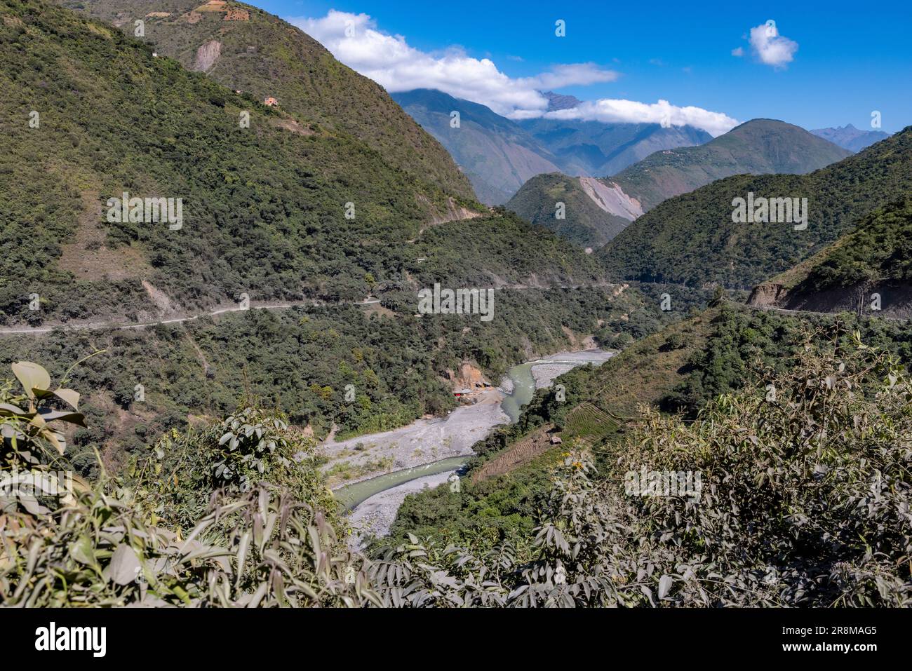 Scenic drive through the remote Bolivian Andes: passing small ...