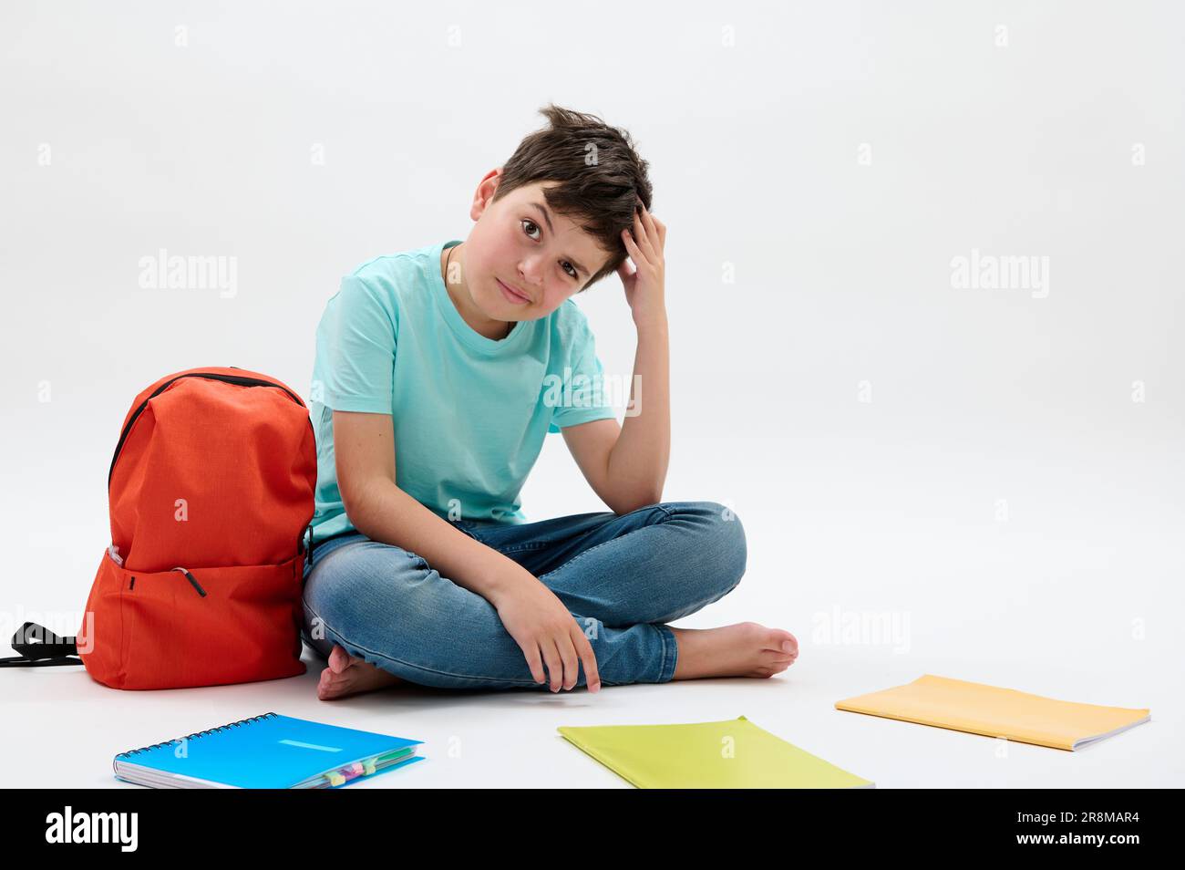 Student scratching head teenager hi-res stock photography and images ...