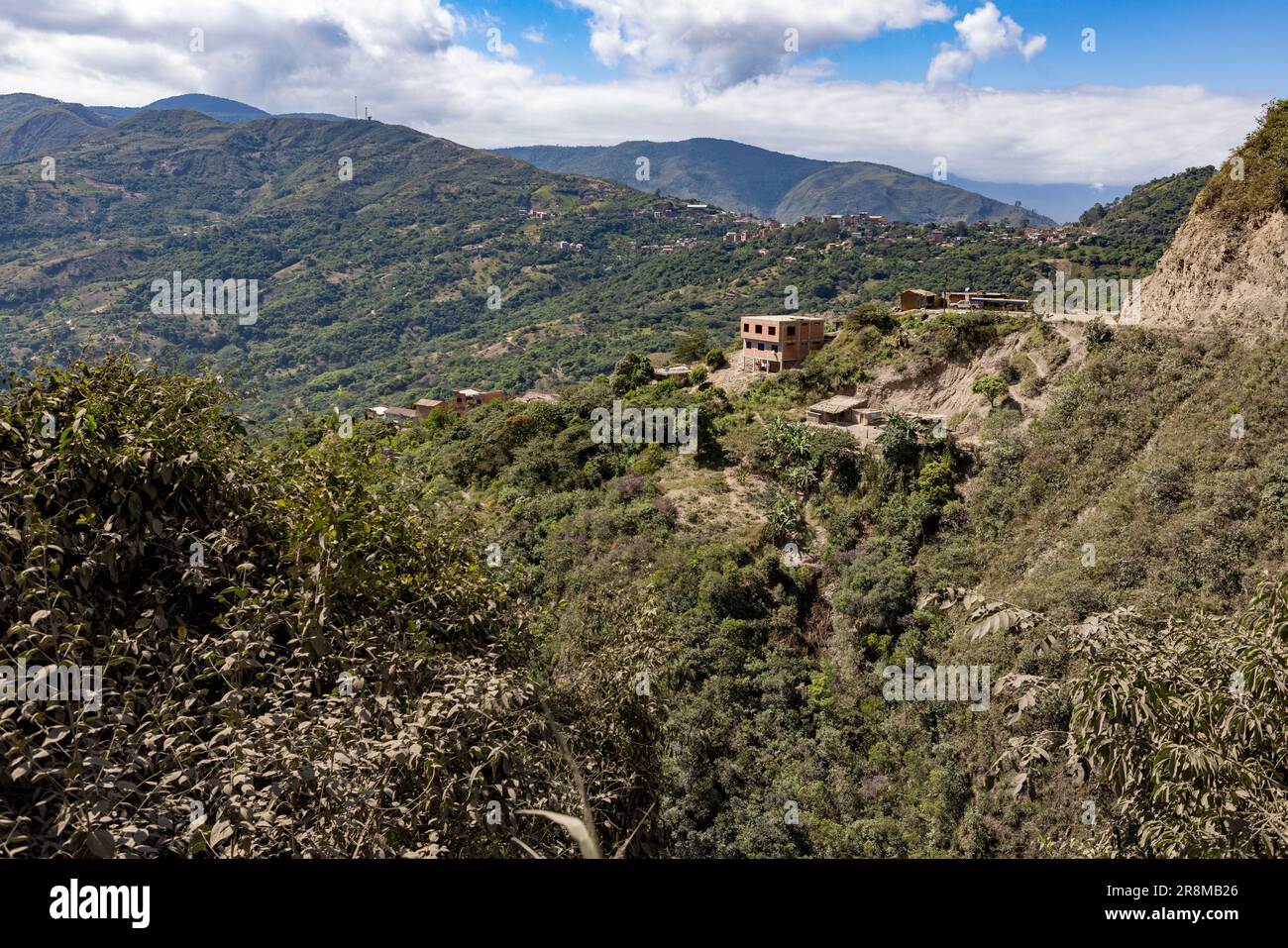 Scenic drive through the remote Bolivian Andes: passing small ...