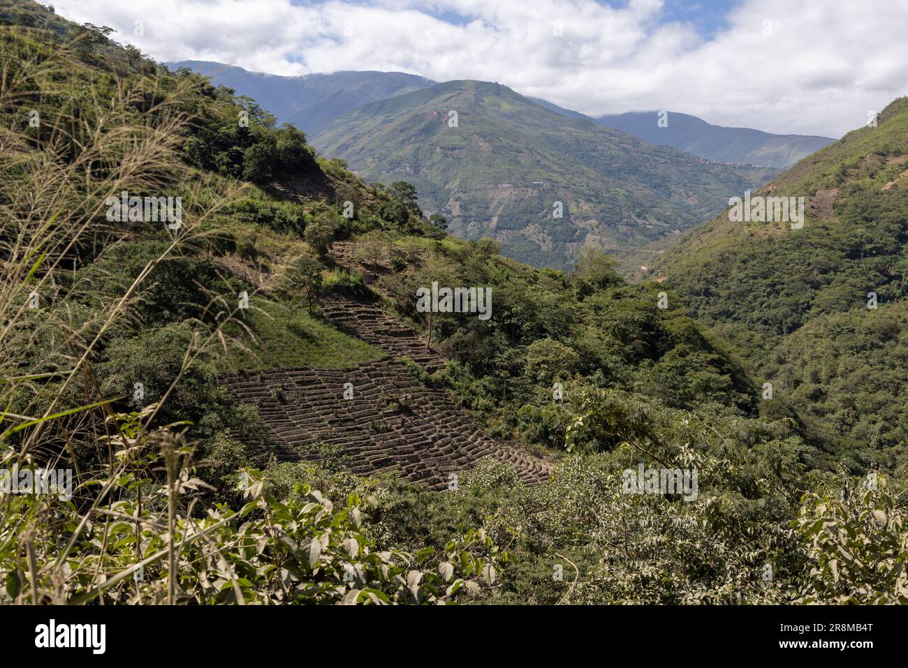 Scenic drive through the remote Bolivian Andes: passing small ...