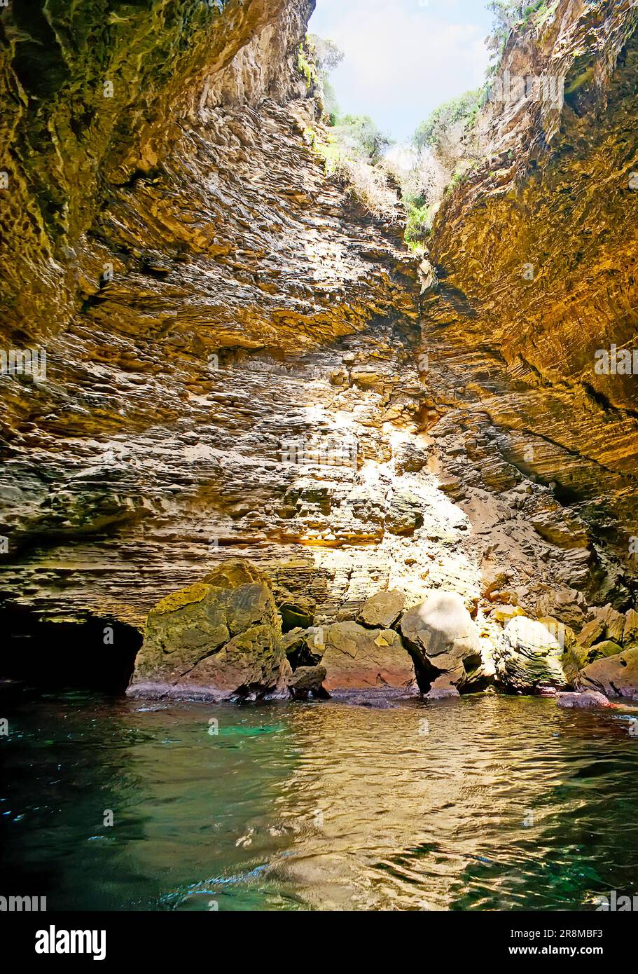 Explore the picturesque Chapeau de Napoleon grotto, located in cliff on ...