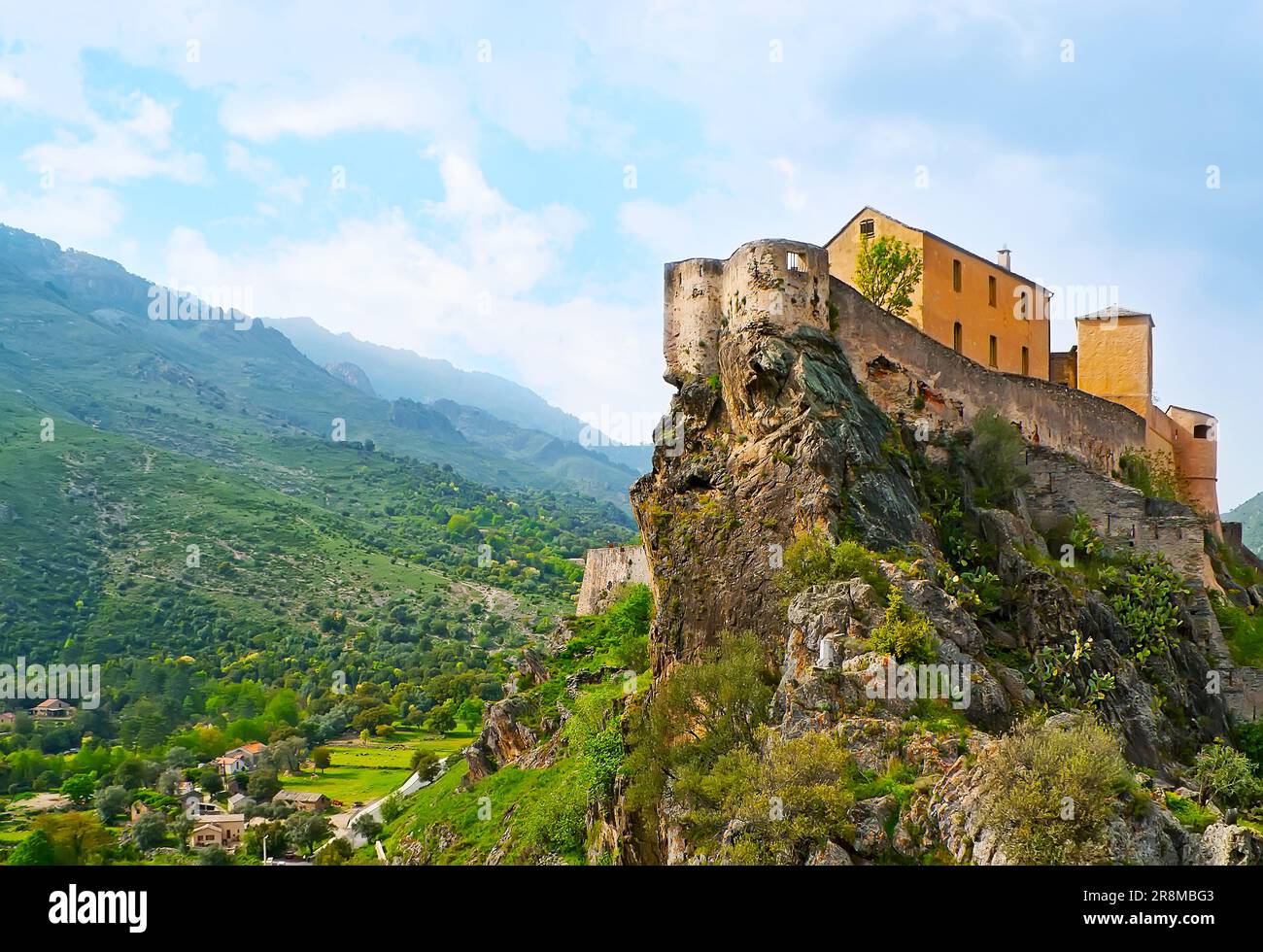 The rocky outcrop with medieval Citadel of Corte, located among the ...