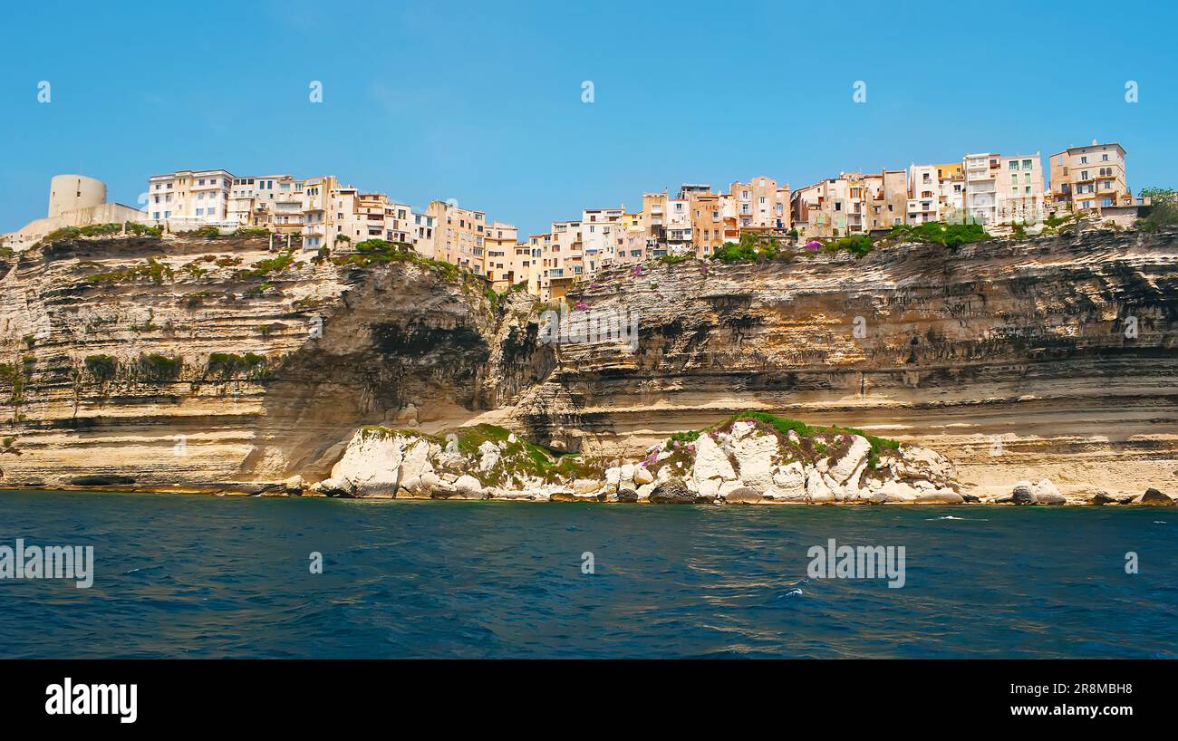 The massive limestone cliffs of Bonifacio coastline with row of ...