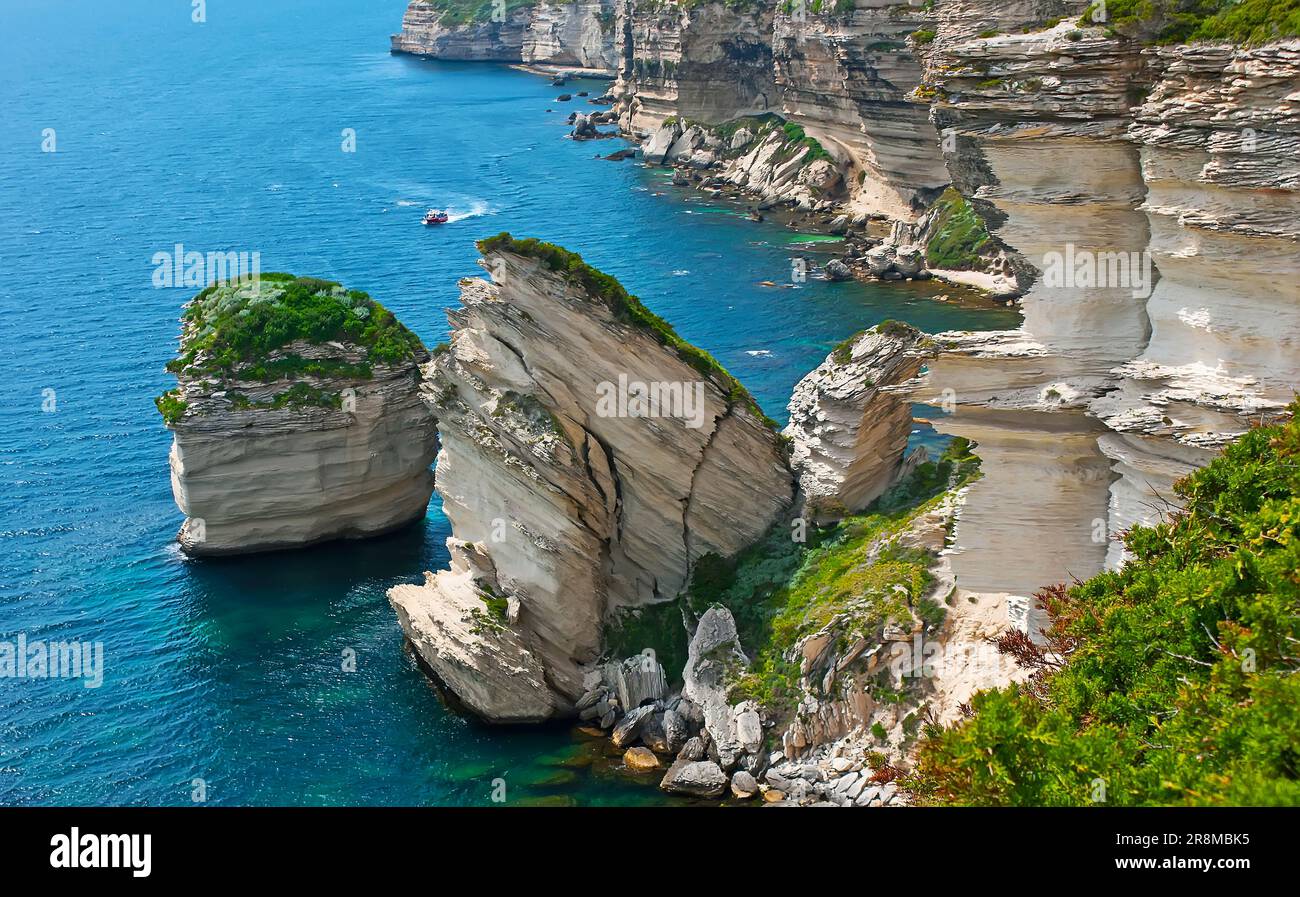 The picturesque coastline of Bonifacio with white limestone cliffs and ...