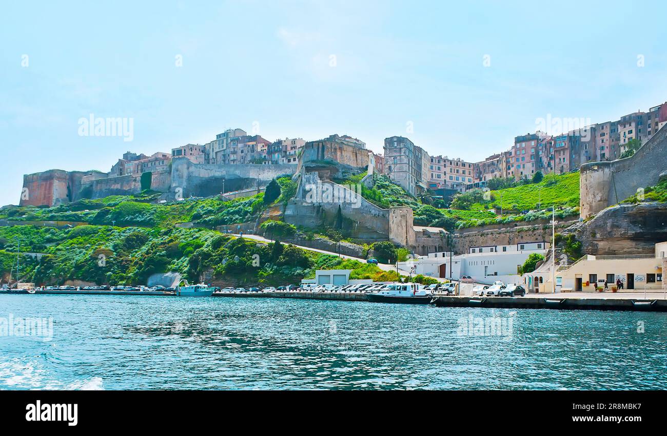 The large historic town of Bonifacio is located atop the tall limestone ...