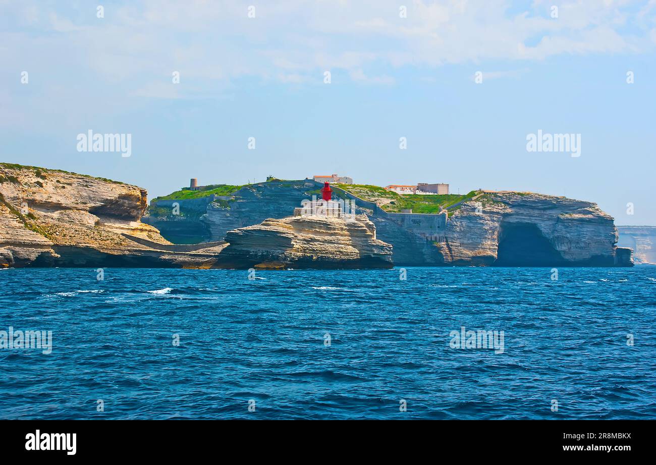 The coast of Bonifacio with a view on Punta San Antonio tip, La Madonetta lighthouse and the ...