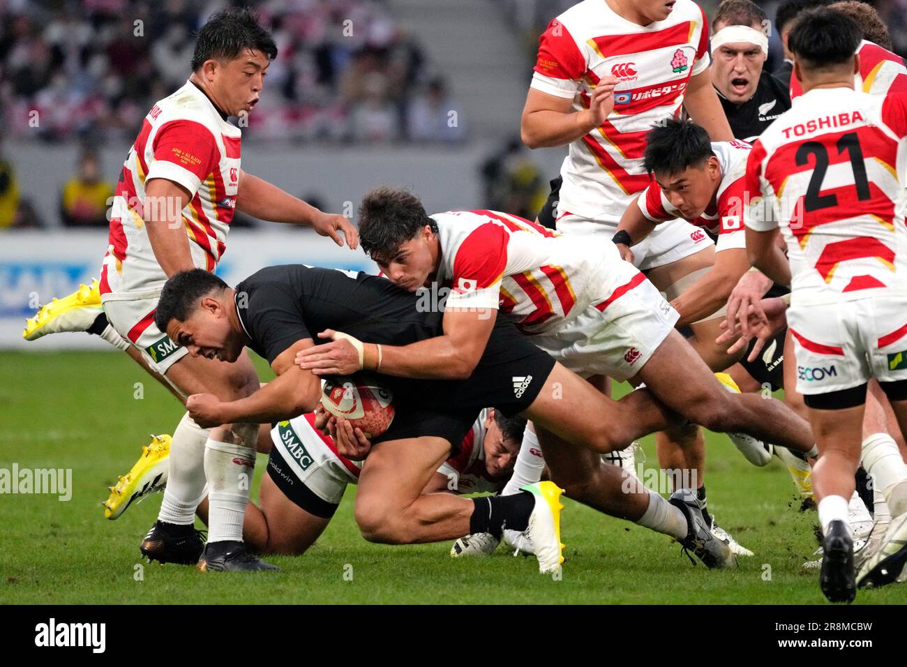 FILE - New Zealand's Anton Lienert-Brown, left, is tackled by Japan's ...