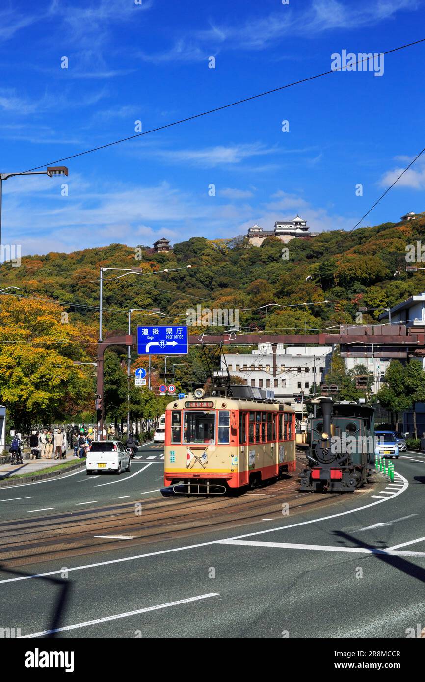 Trams, Botchan train, and Matsuyama Castle Stock Photo - Alamy