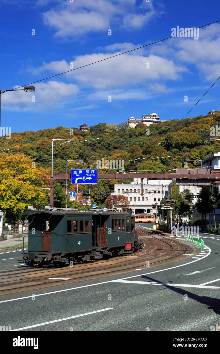 Botchan train and Matsuyama Castle Stock Photo - Alamy