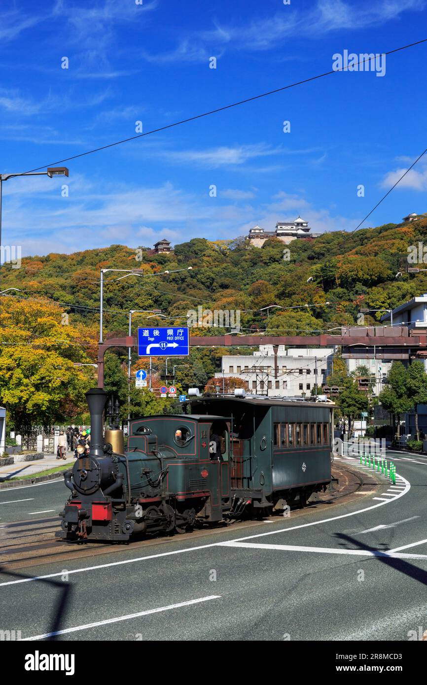 Botchan train and Matsuyama Castle Stock Photo - Alamy