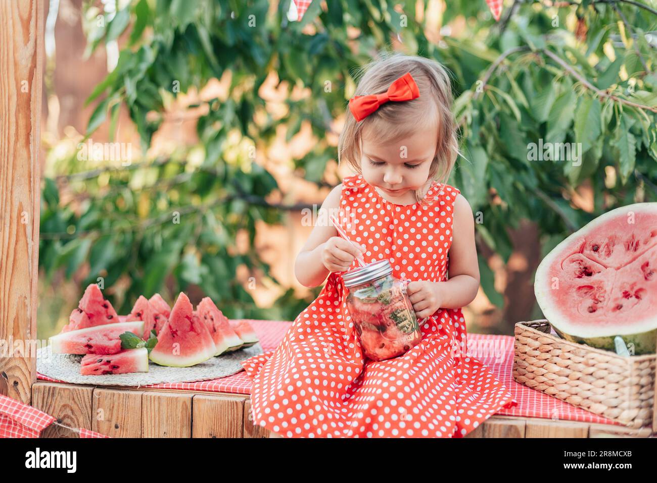 Lemonade Stand. Adorable little girl trying to sell lemonade ...