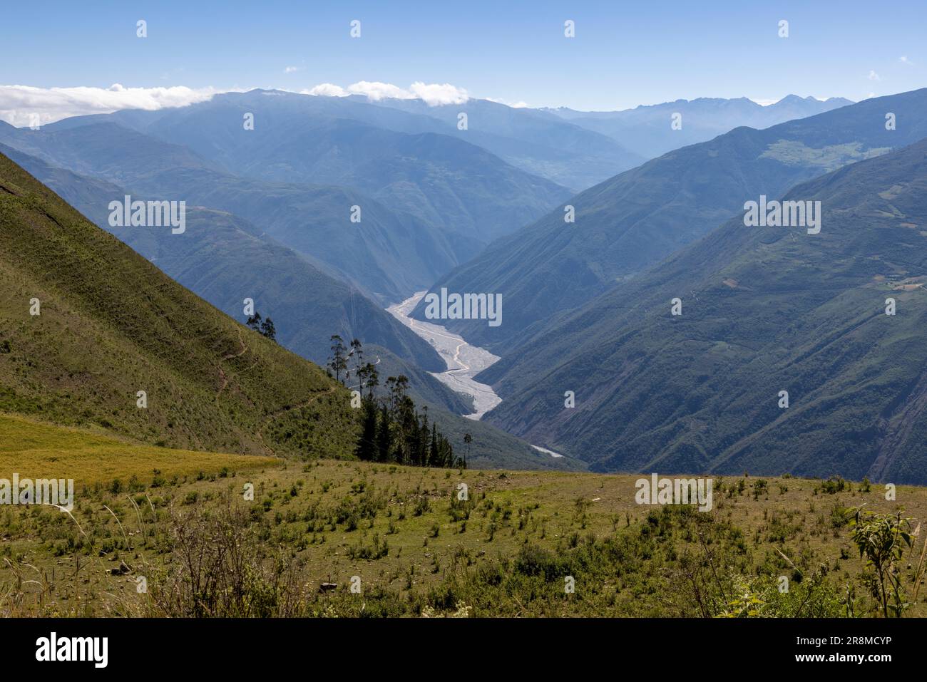 Traveling through the scenic Bolivian Andes with view into the valley ...