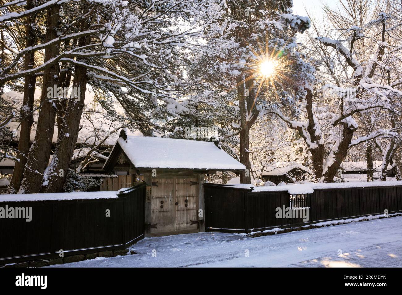 Sun over the piled up snow on Kakunodate samurai residences Stock Photo ...