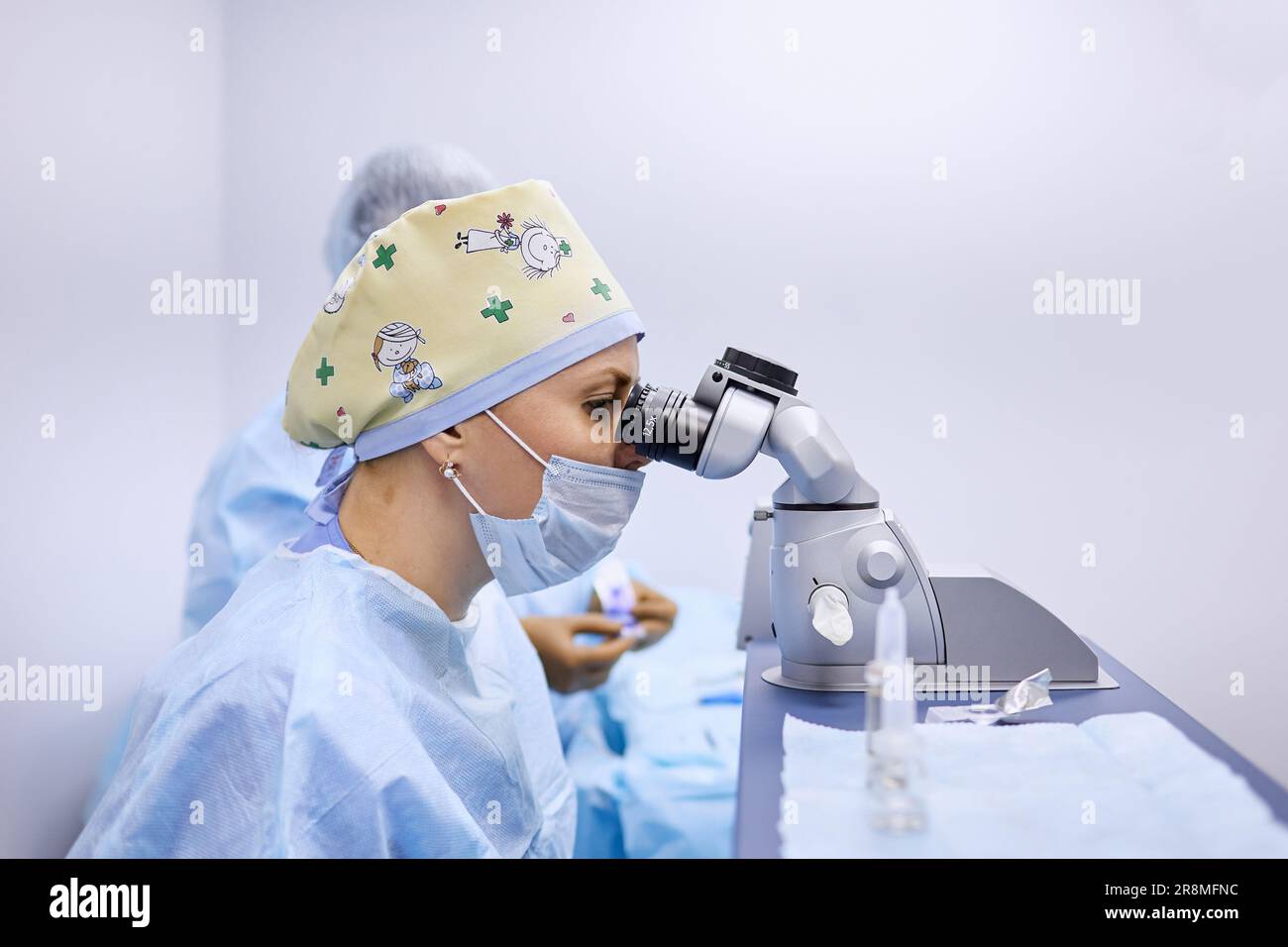 The surgeon uses a microscope during surgery Stock Photo - Alamy