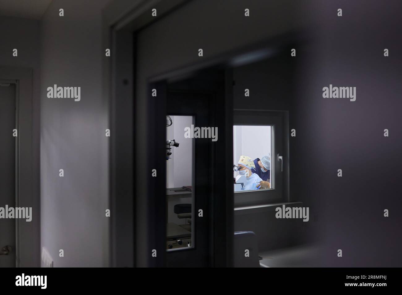 Surgeons performing eye surgery in the operating room Stock Photo - Alamy