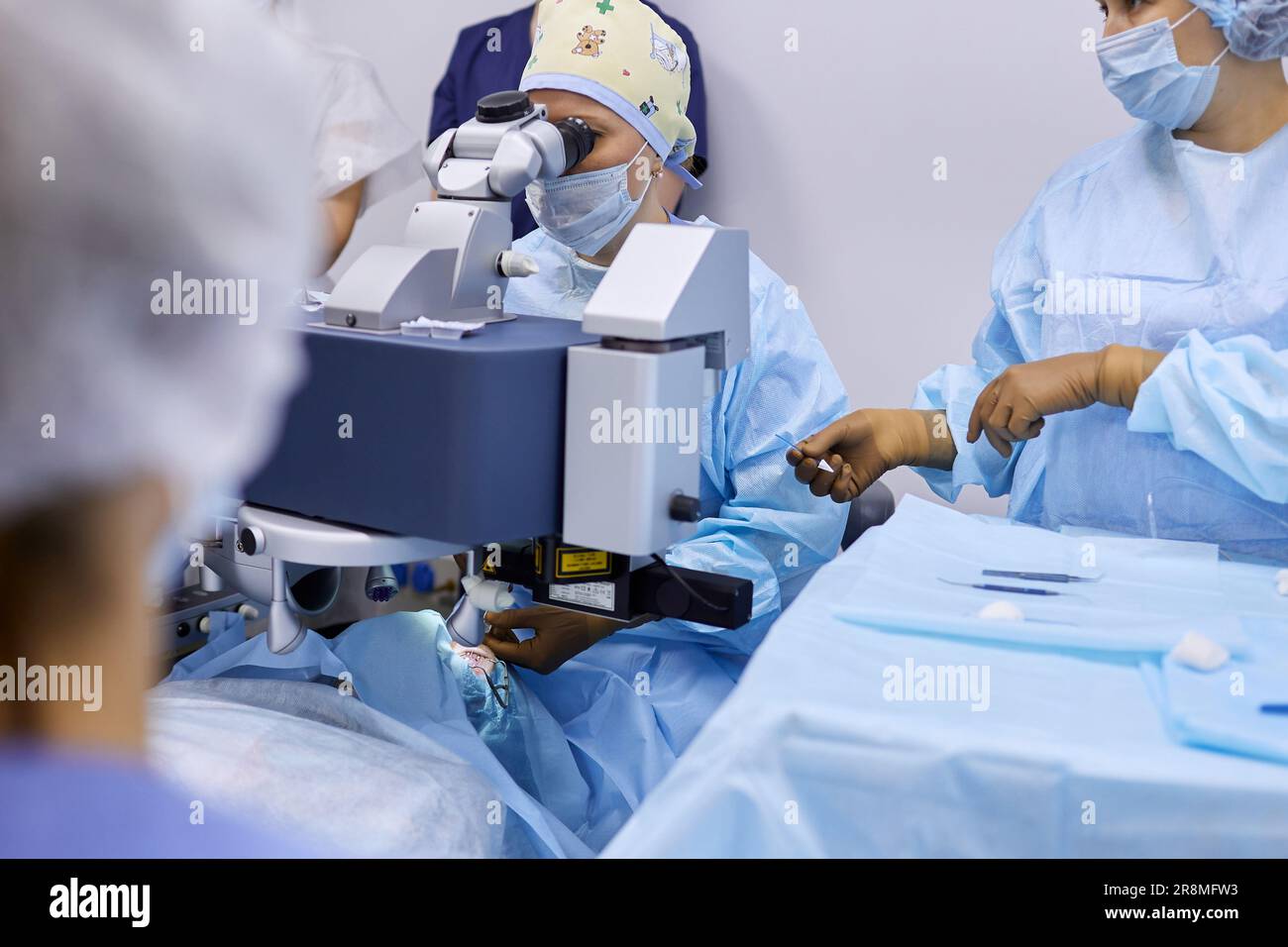 The surgeon uses a microscope during surgery Stock Photo - Alamy