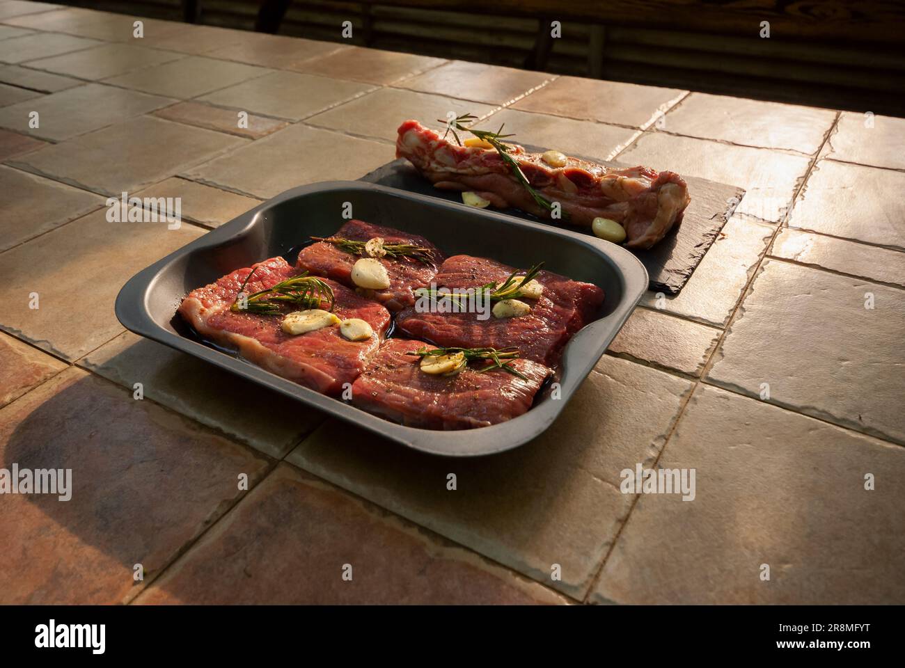 large steaks. fresh pieces of meat. Spices for meat Stock Photo - Alamy