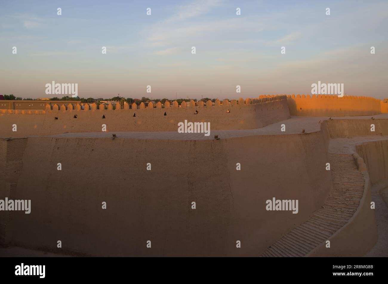 The walls of the ancient city of Khiva at sunset, Uzbekistan Stock ...