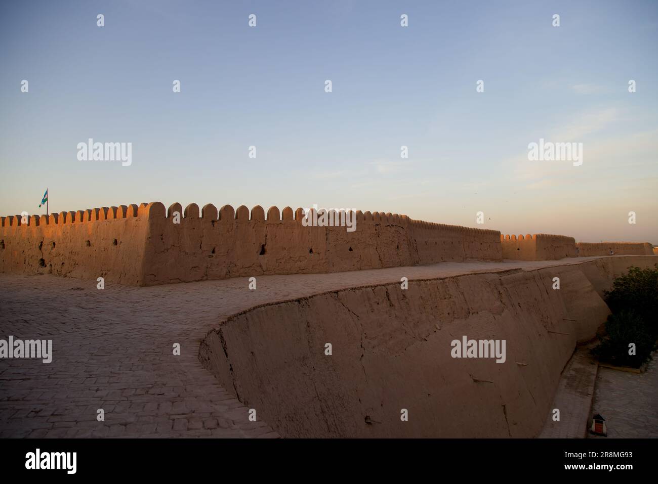 The walls of the ancient city of Khiva at sunset, Uzbekistan Stock ...