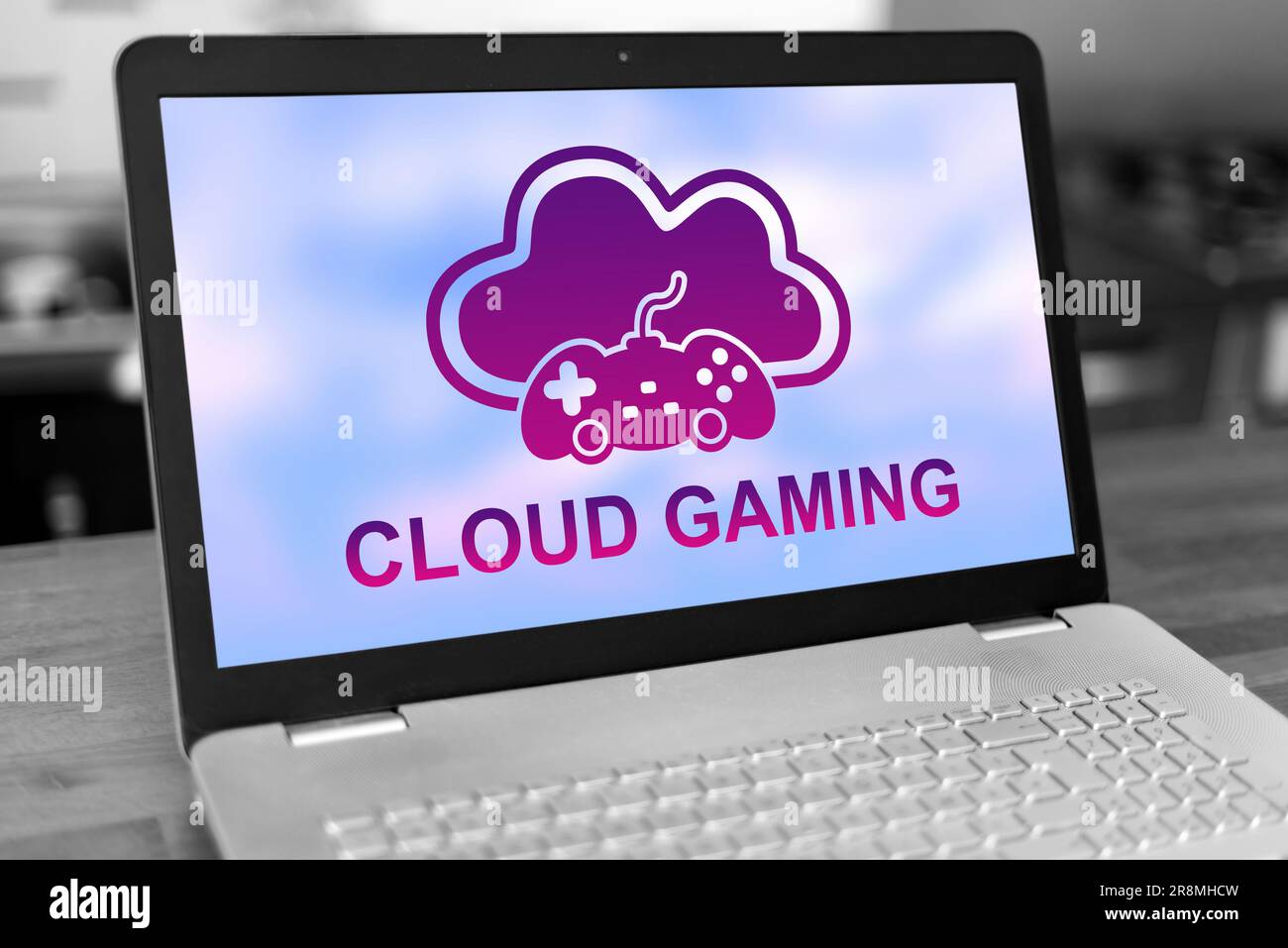 Laptop screen with cloud gaming concept Stock Photo - Alamy