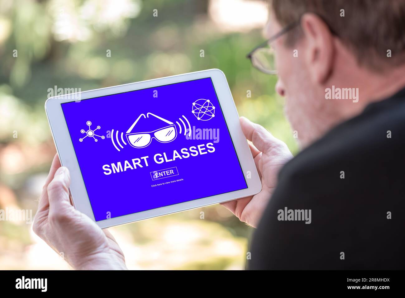 Tablet screen displaying a smart glasses concept Stock Photo - Alamy