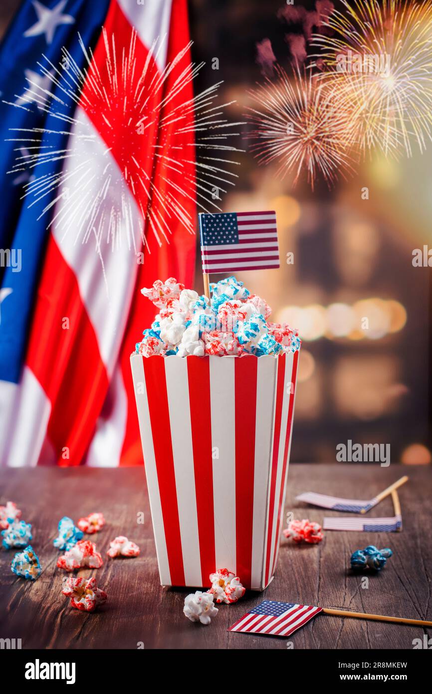 Golden paper cups with red, blue, white popcorn. US colors for 4th july ...