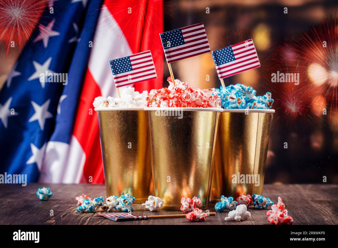 Golden paper cups with red, blue, white popcorn. US colors for 4th july ...