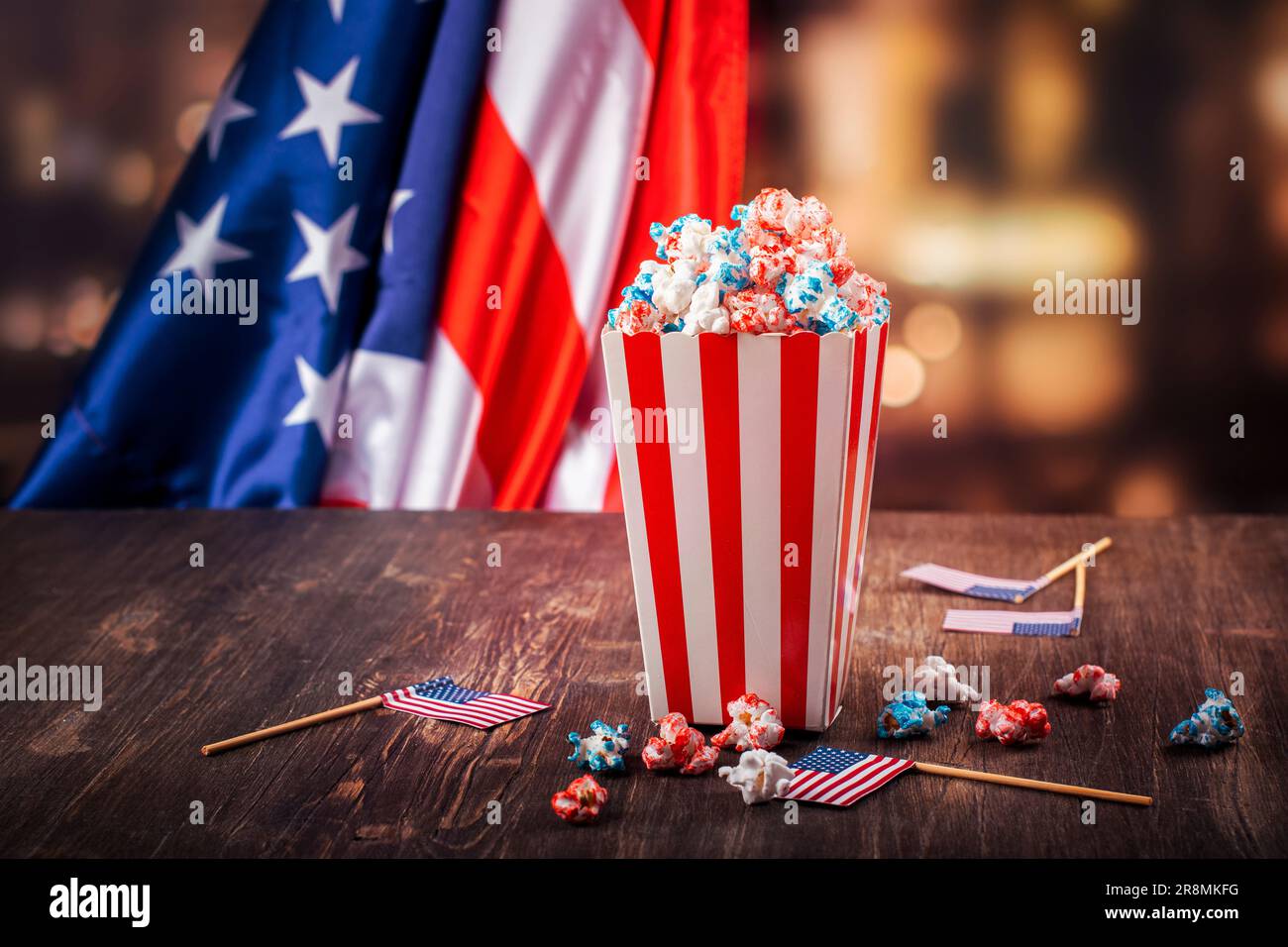 Golden paper cups with red, blue, white popcorn. US colors for 4th july ...