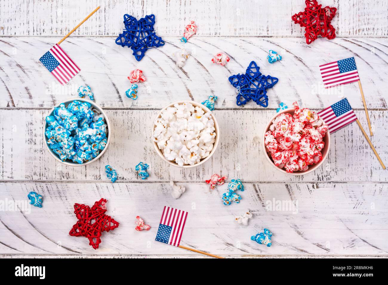 Golden paper cups with red, blue, white popcorn. US colors for 4th july ...