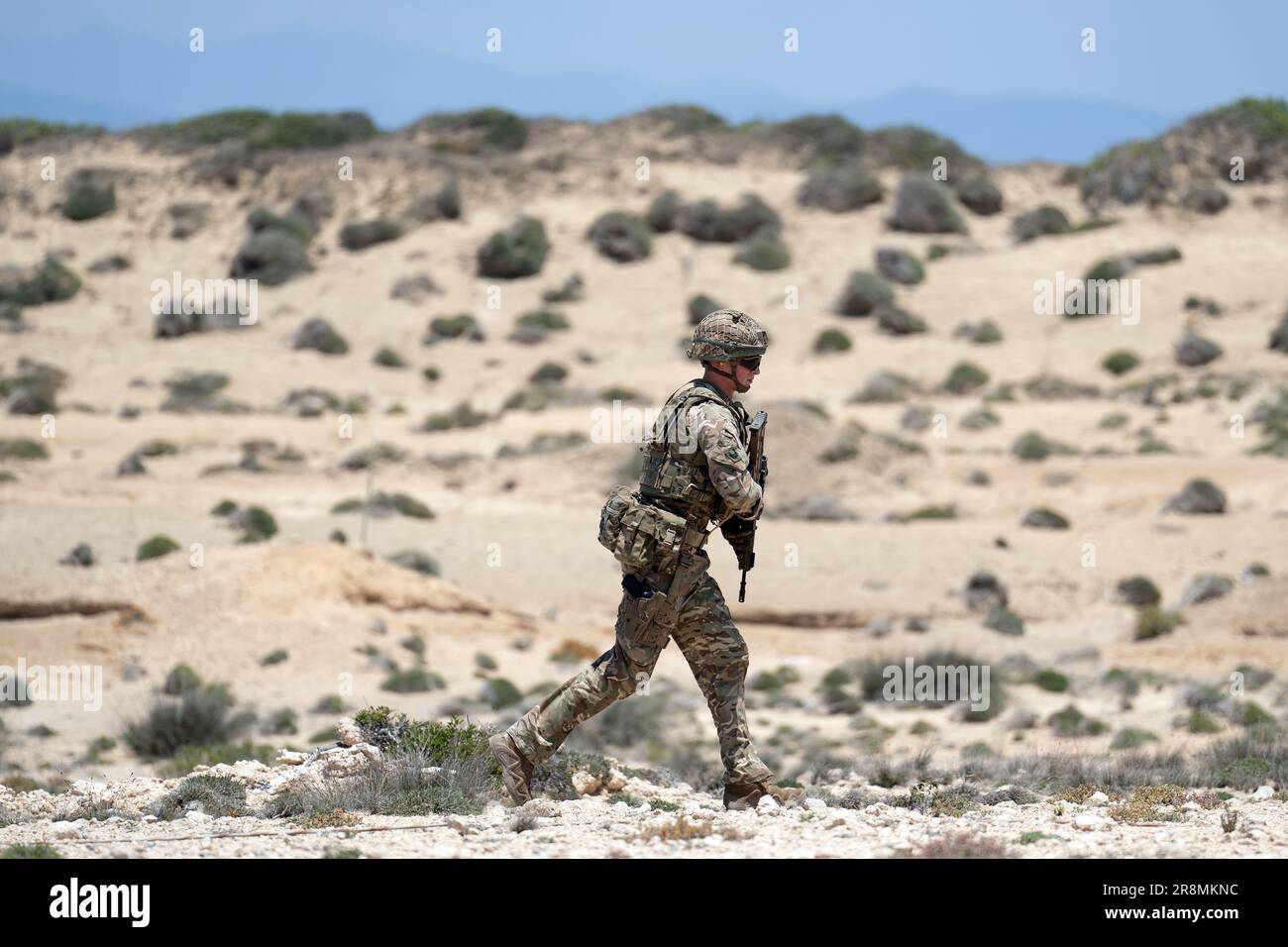 A member of the RAF Regiment after deploying from a Puma helicopter of ...
