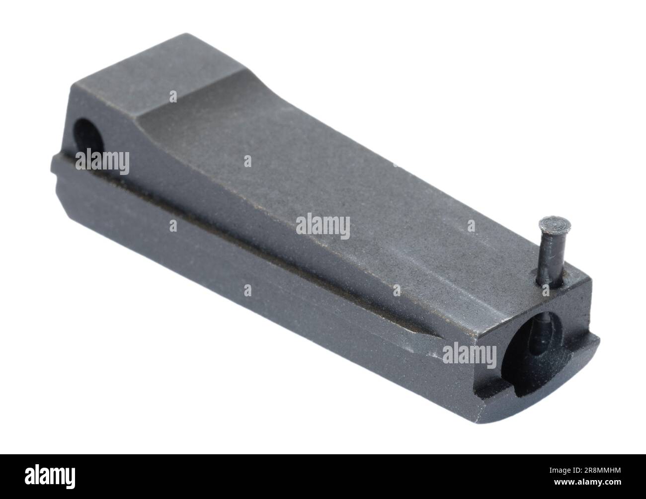 Pin going into semi-auto pistol mainspring housing isolated on white ...