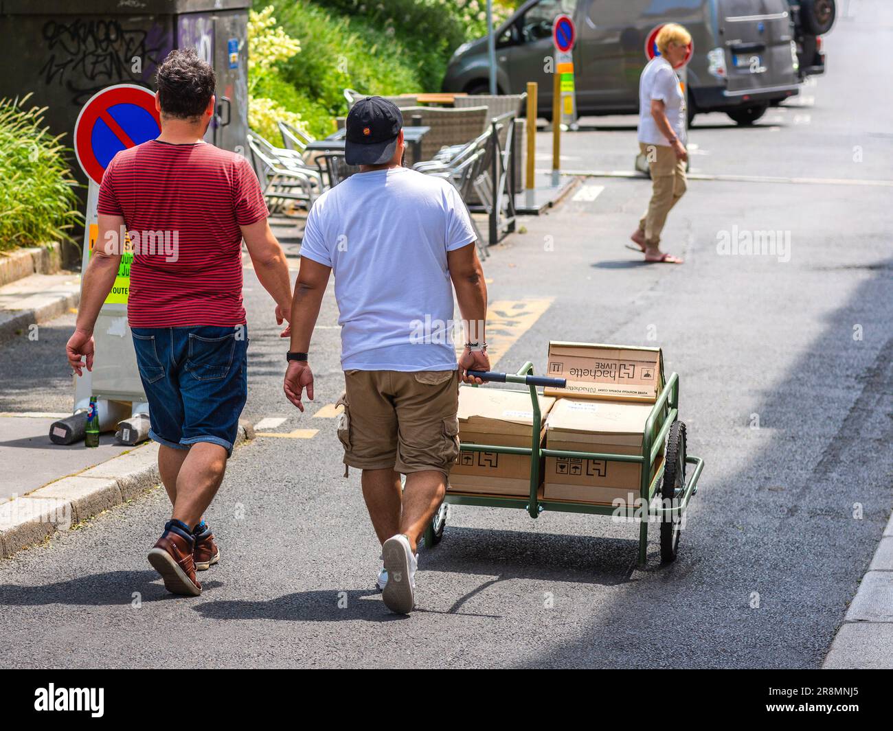 Two men pushing handcart loaded with parcels - Tours, Indre-et-Loire ...