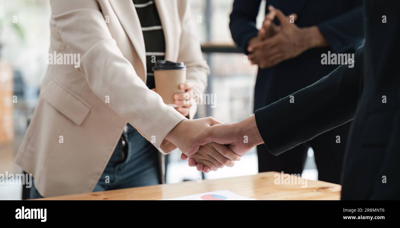 End of meeting handshake of two happy businessmen after a contract ...