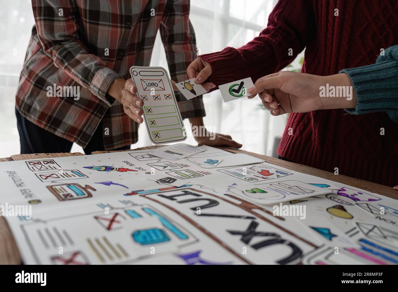 The web designer team is helping to design applications for mobile ...