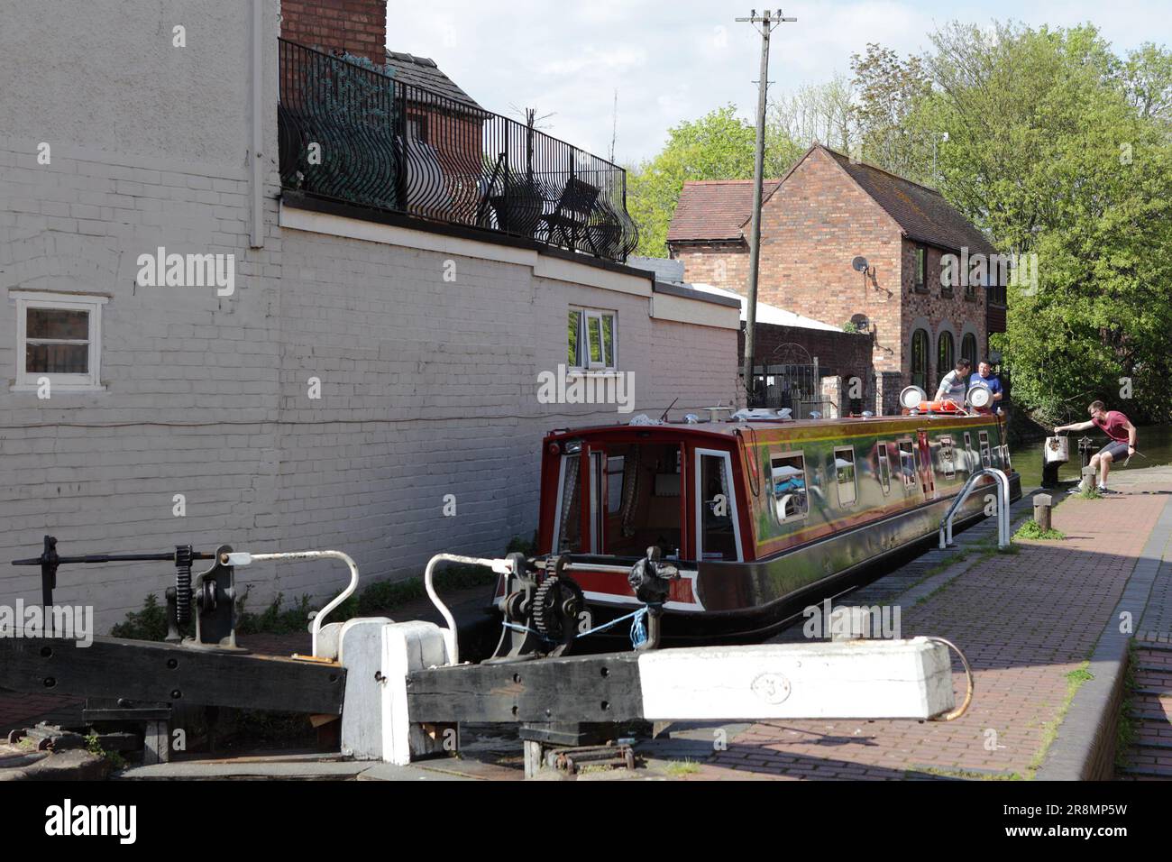 On a beautiful late spring day in Worcester a barge enters a lock on ...