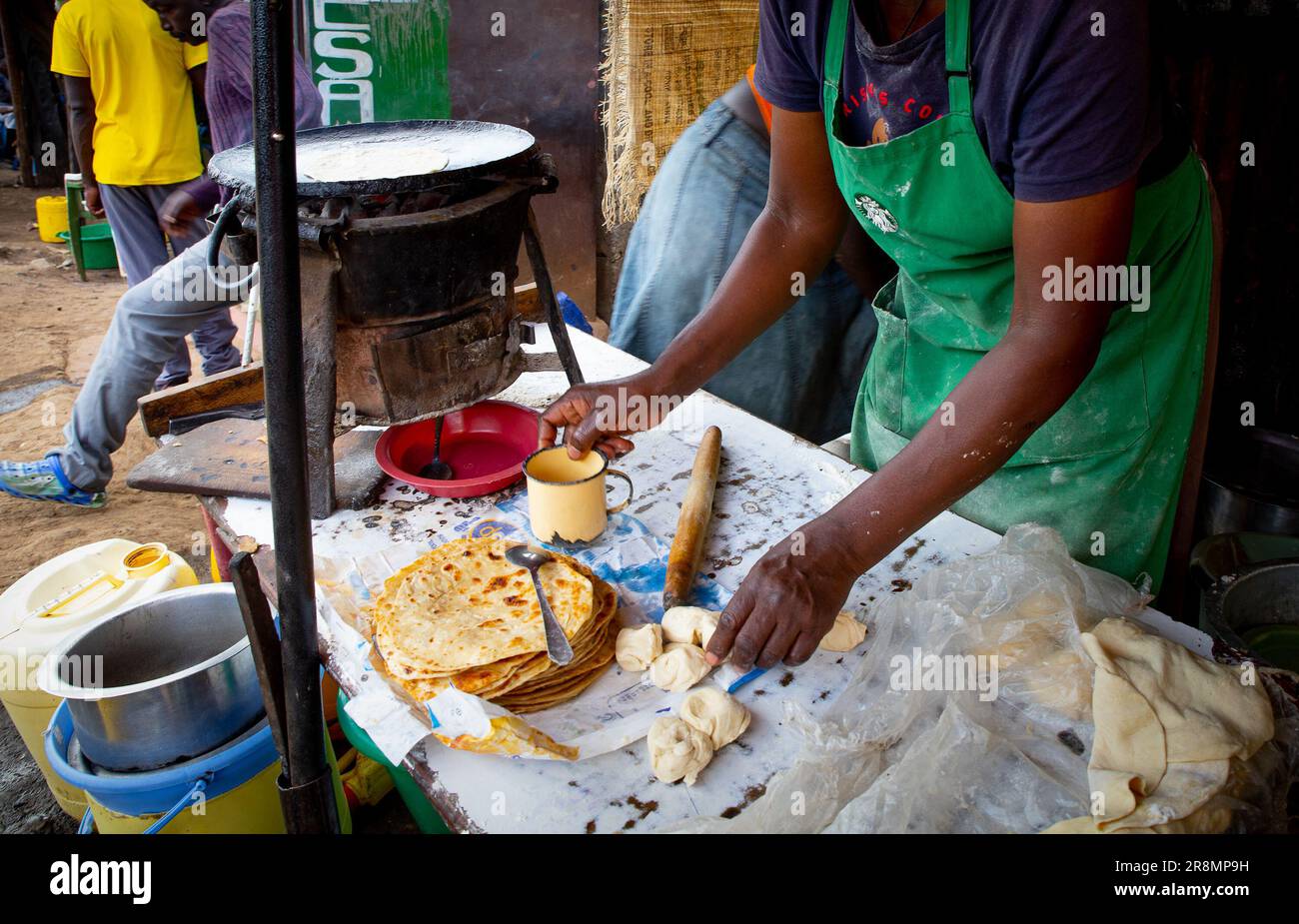 Nairobi, Kenya. 20th June, 2023. A woman prepares Chapati (is an ...