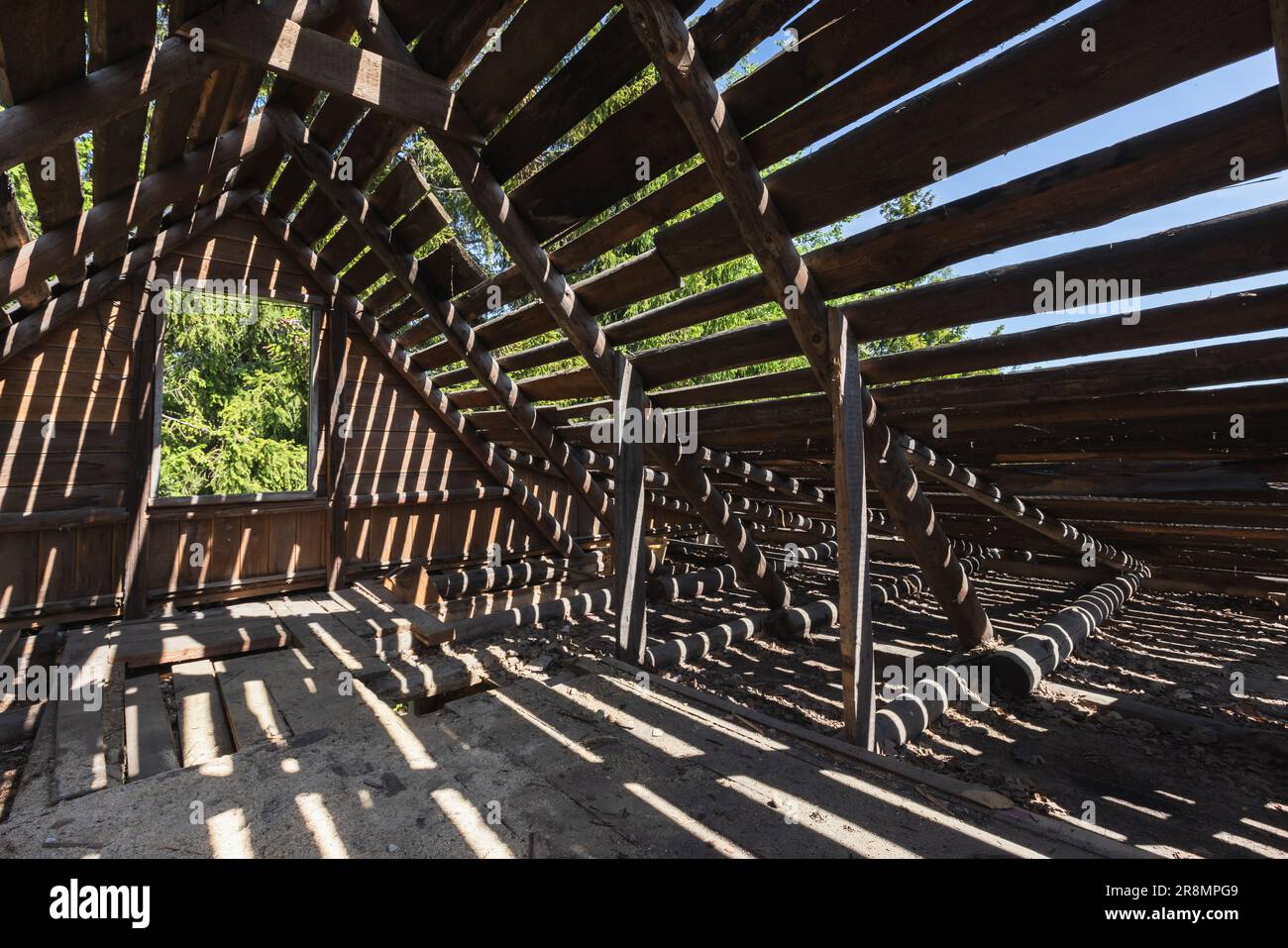 Abstract grunge wooden interior with striped pattern of sunbeams and ...