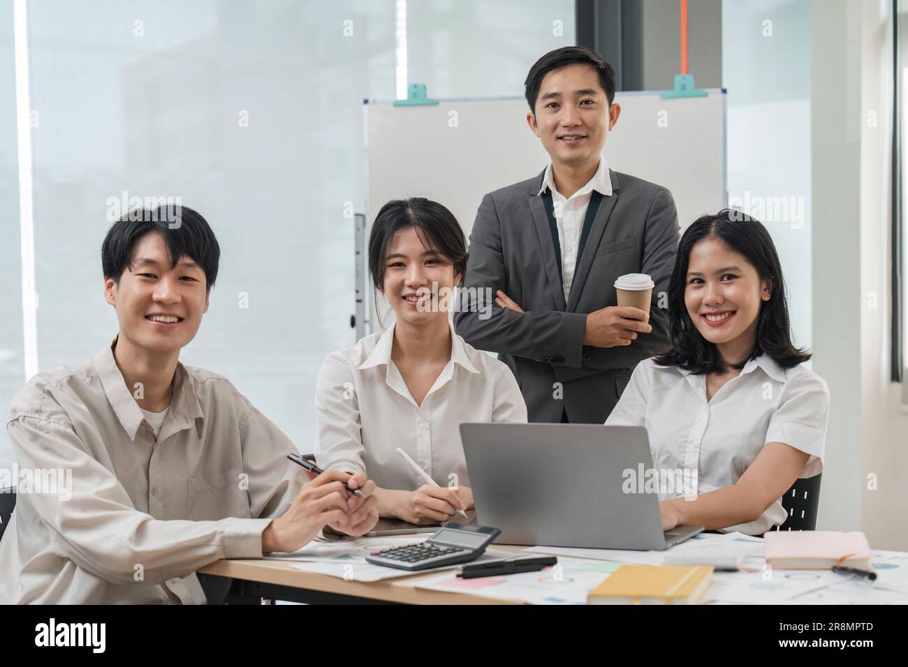 succesful business team smiling with teamwork corporate office ...