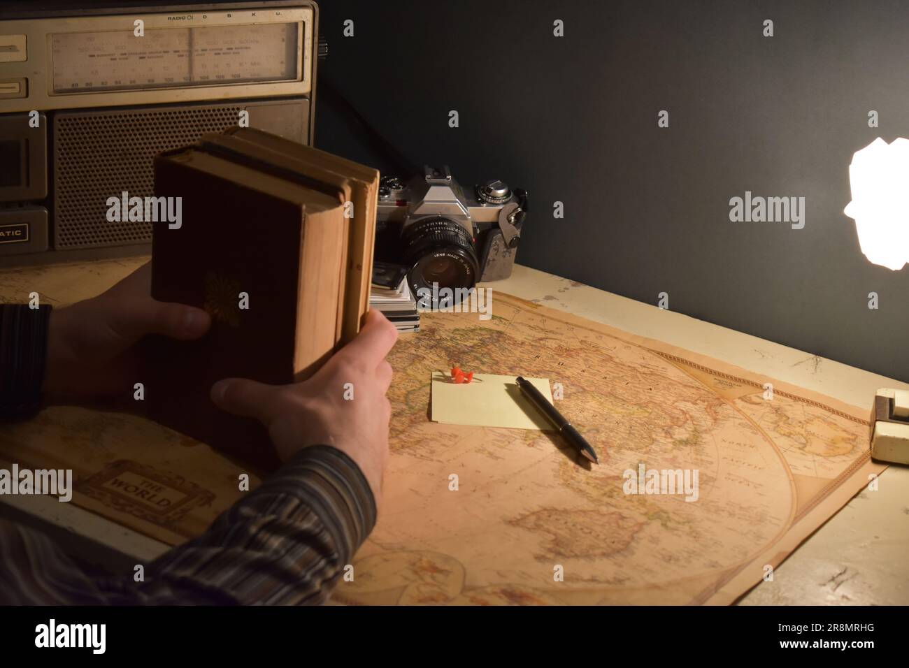 vintage workspace with books, camera and radio Stock Photo - Alamy