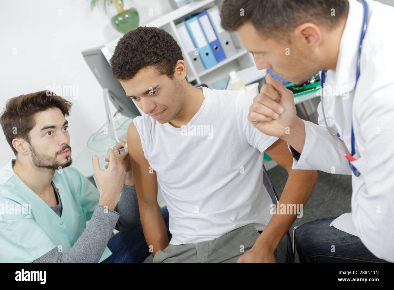 internist doctor learning with patient and doctor Stock Photo - Alamy