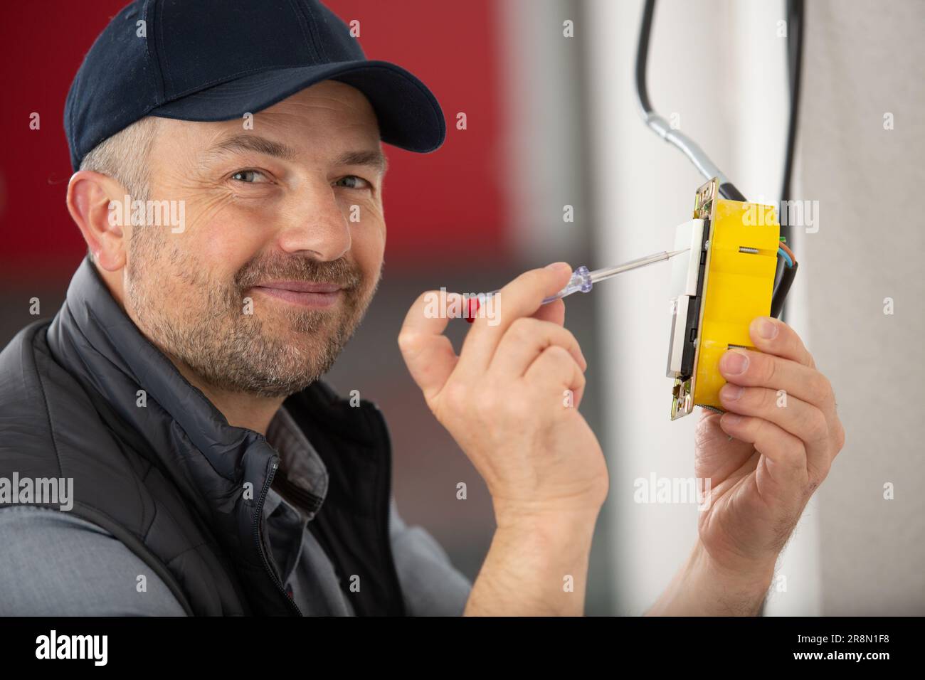 construction worker works on renovation of apartment Stock Photo - Alamy
