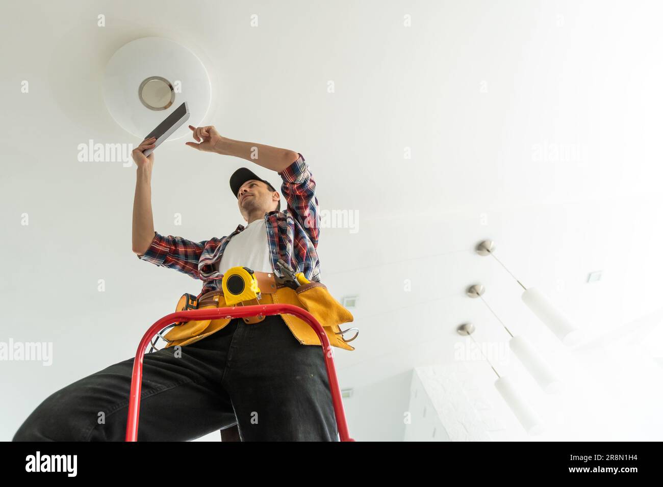 Electrician man change led light hi-res stock photography and images - Alamy