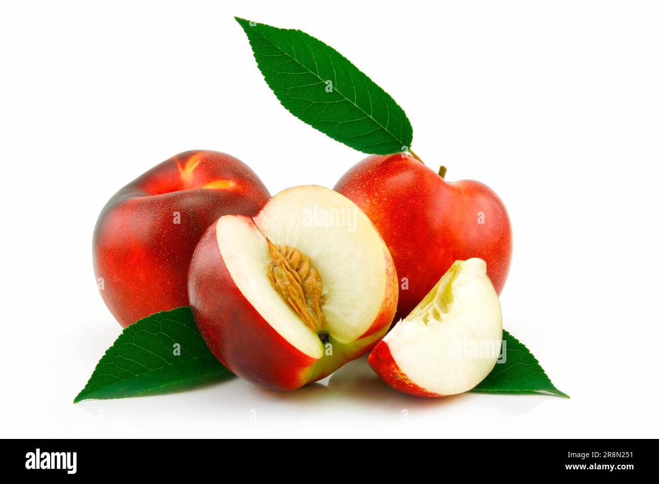 Ripe Sliced Peach (Nectarine) with Green Leafs Isolated on White ...