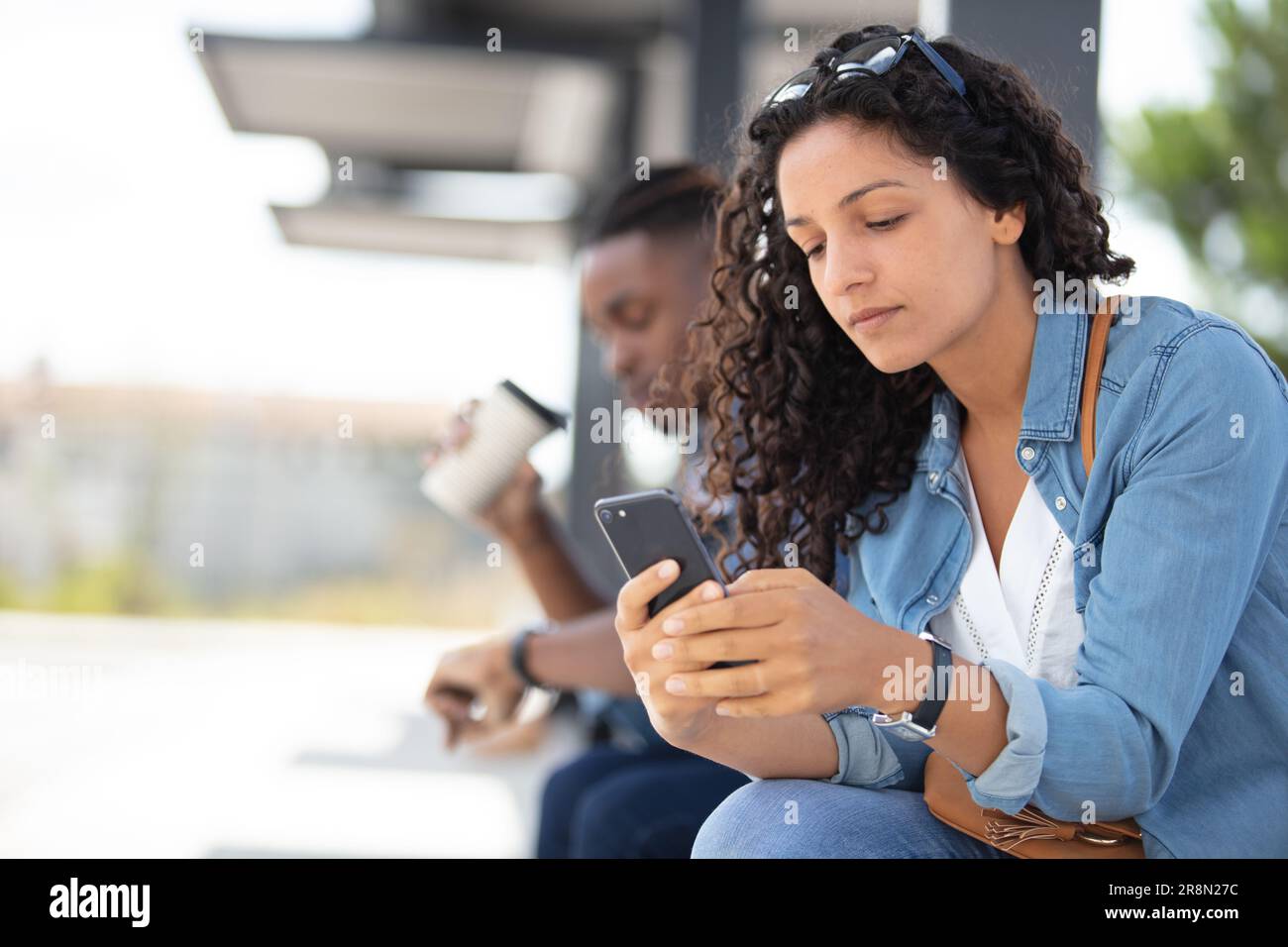 Happy asian woman waiting train hi-res stock photography and images - Alamy
