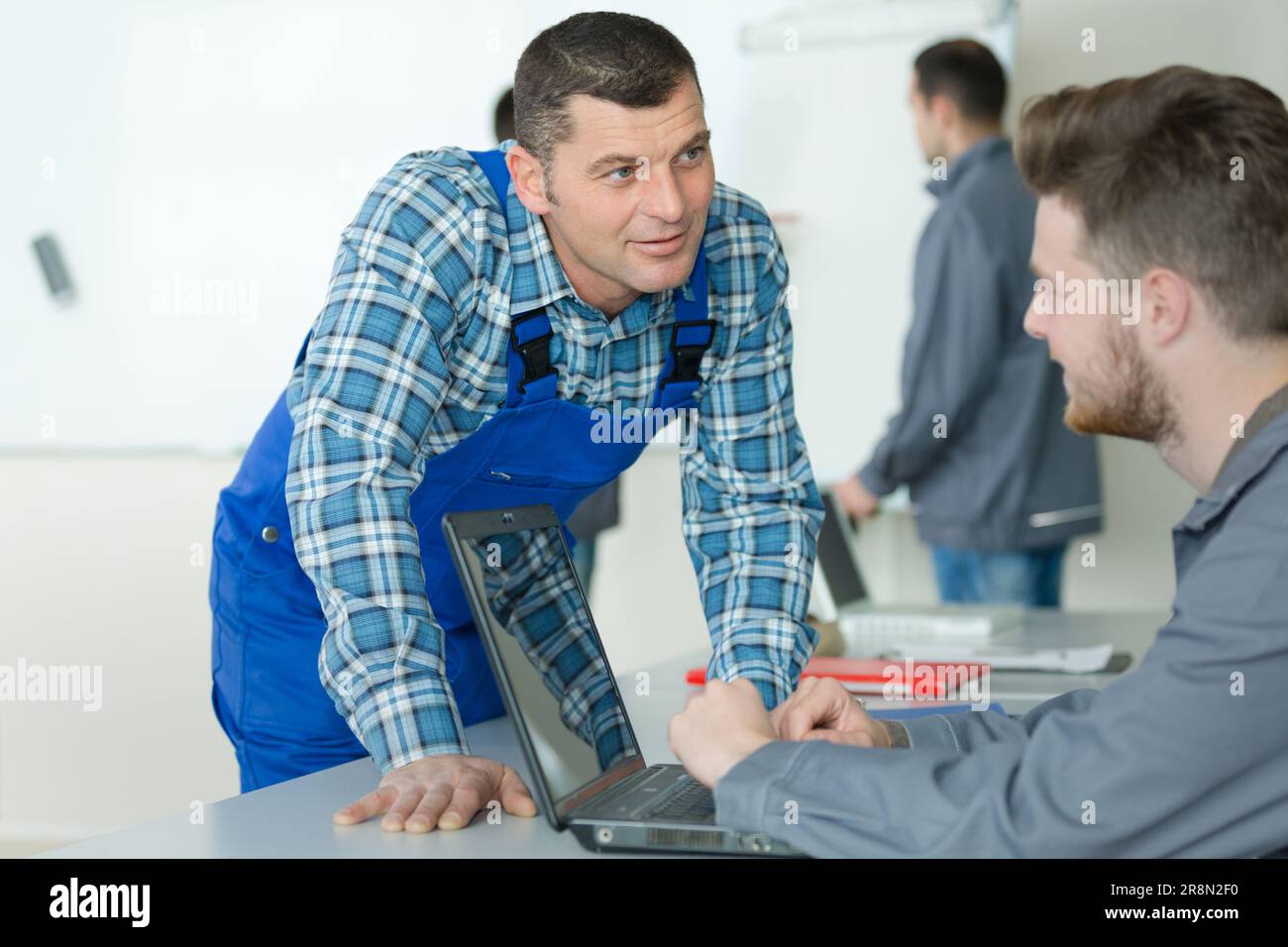 the student with teacher learning technology class Stock Photo - Alamy