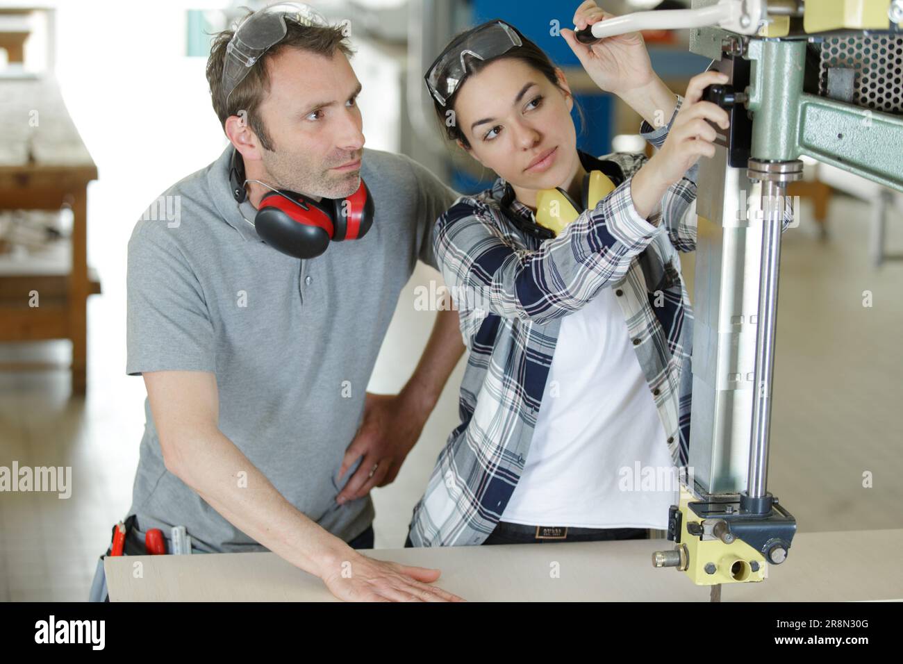 Woman operating saw machine hi-res stock photography and images - Alamy