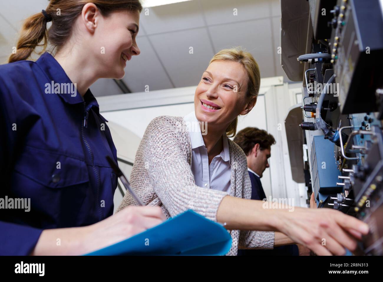 Technician female buttons hi-res stock photography and images - Alamy