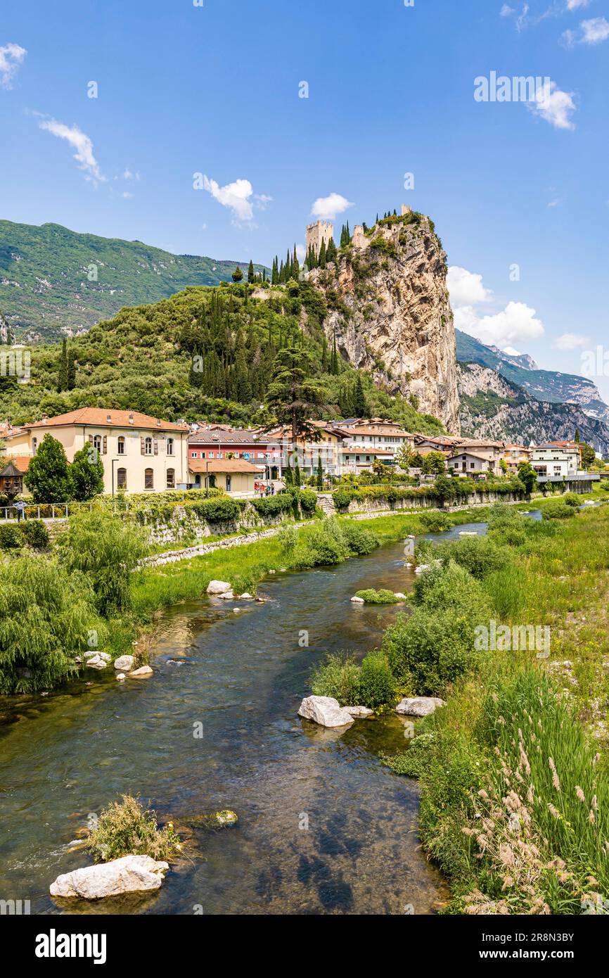 Town view of Arco with the Sarca River and the ruins of Arco Castle ...
