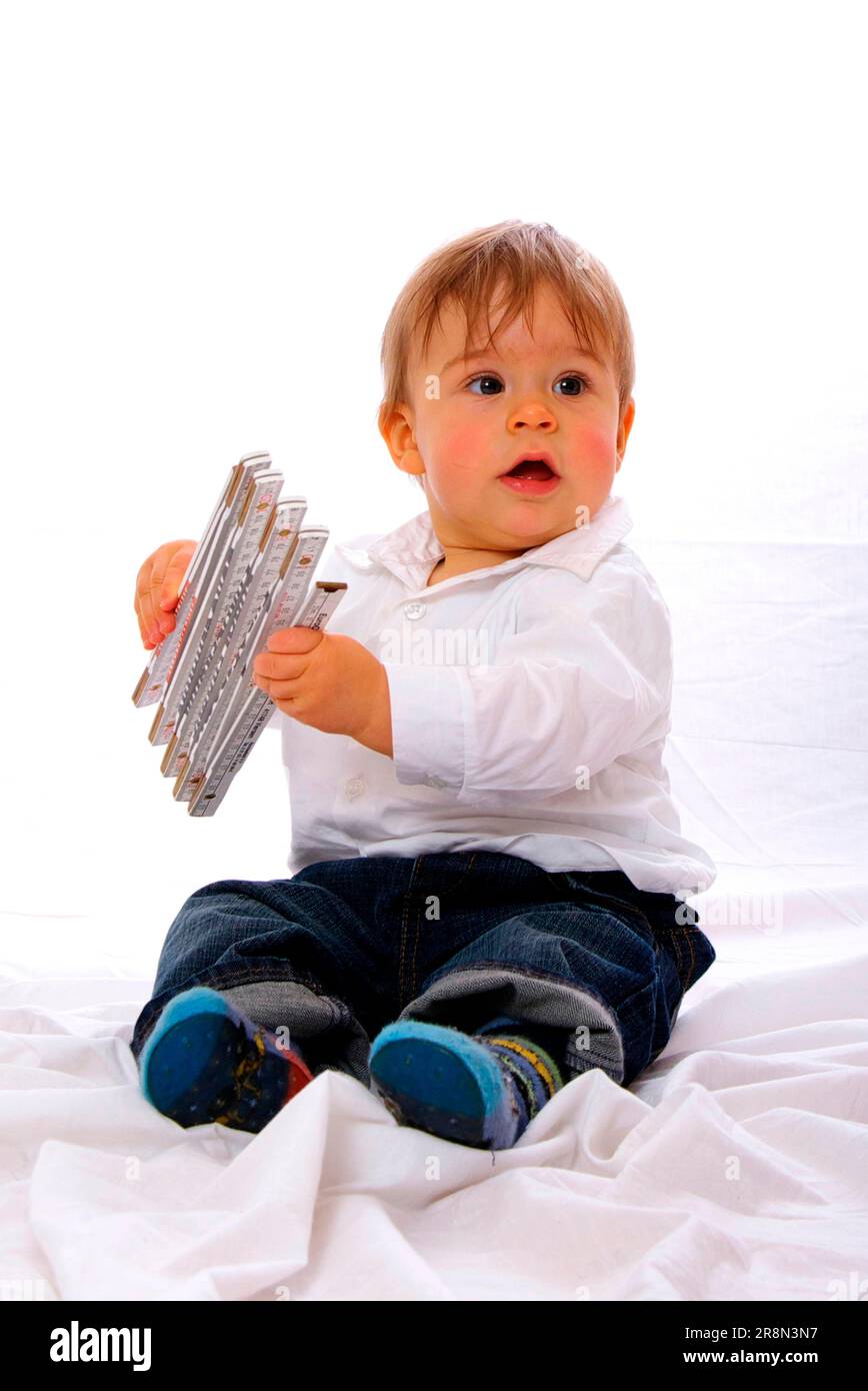 Boy with folding rule Stock Photo - Alamy