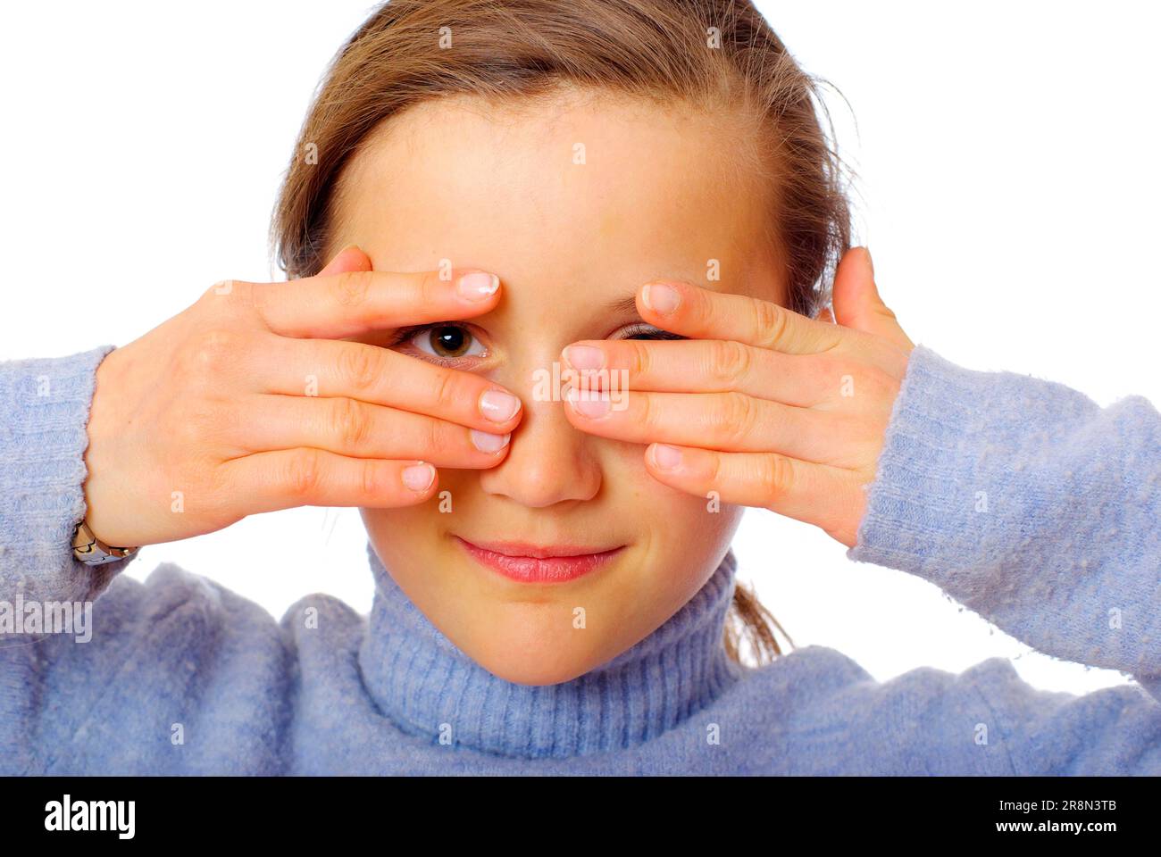 Girl puts her hands in front of her eyes, keeps them closed, keeps them closed Stock Photo - Alamy